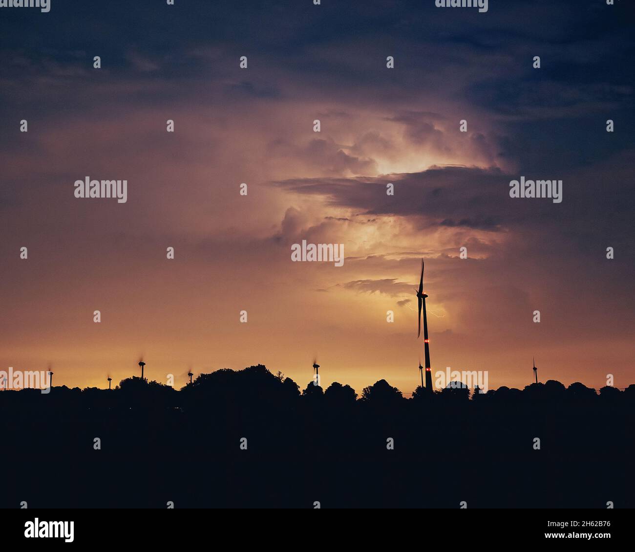 Beautiful weather lights over the field, captured in night Stock Photo ...