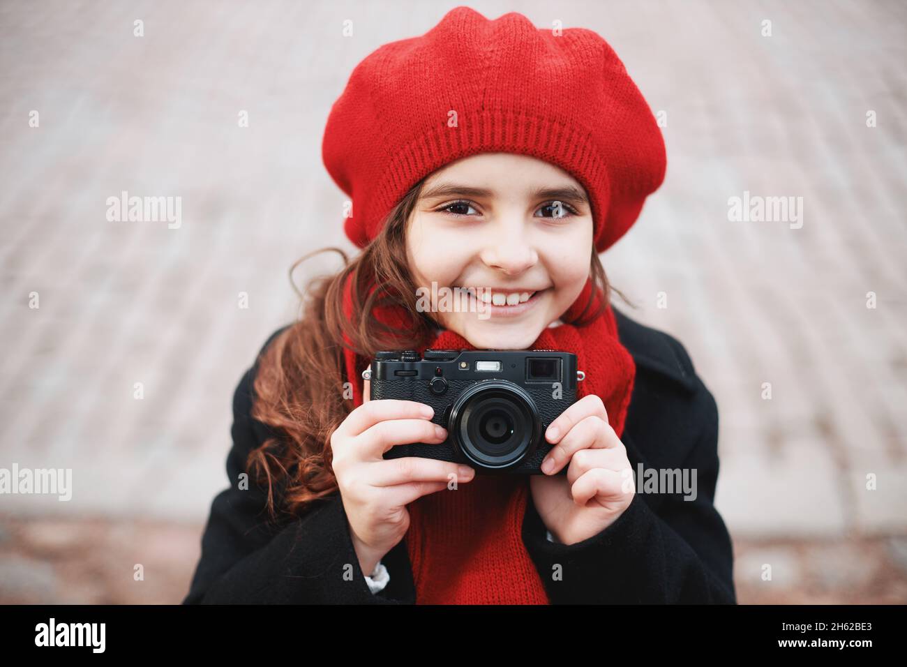 young girl with a camera on a city street. High quality photo Stock ...