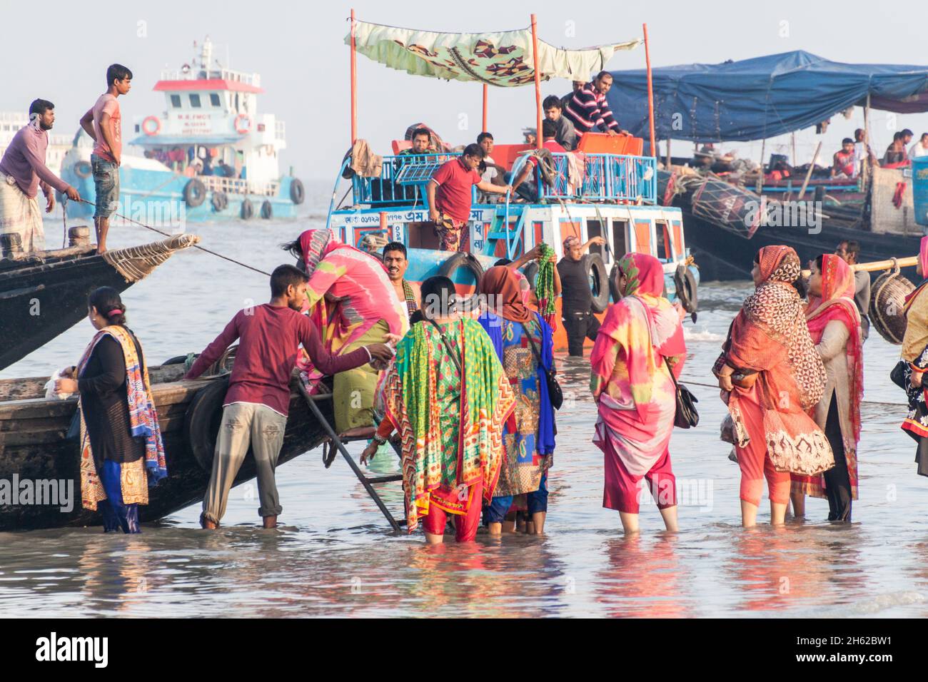 DUBLAR CHAR, BANGLADESH - NOVEMBER 14, 2016: Hindu pilgrims board their ...