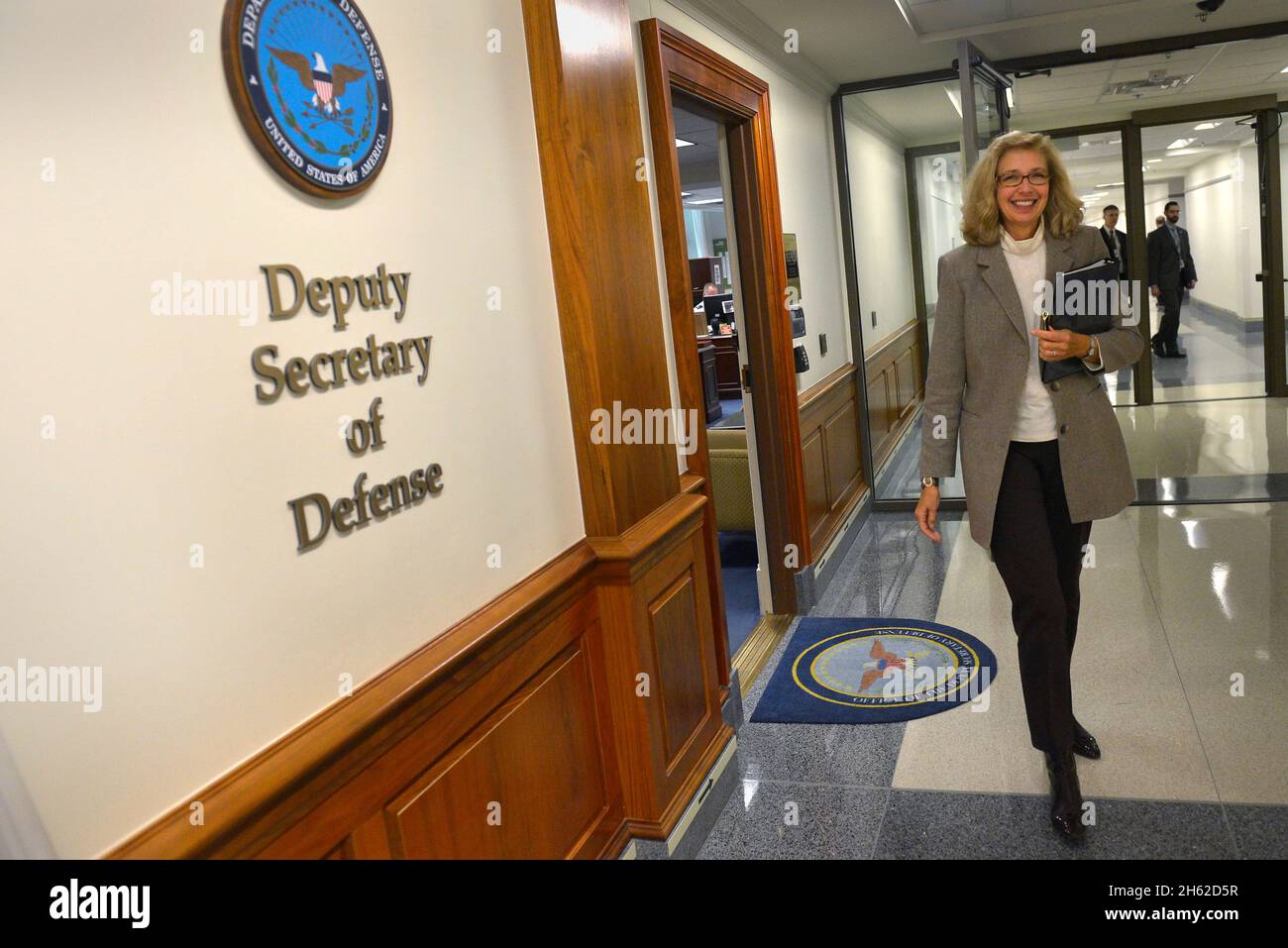 Acting Deputy Secretary of Defense Christine Fox departs her office to ...