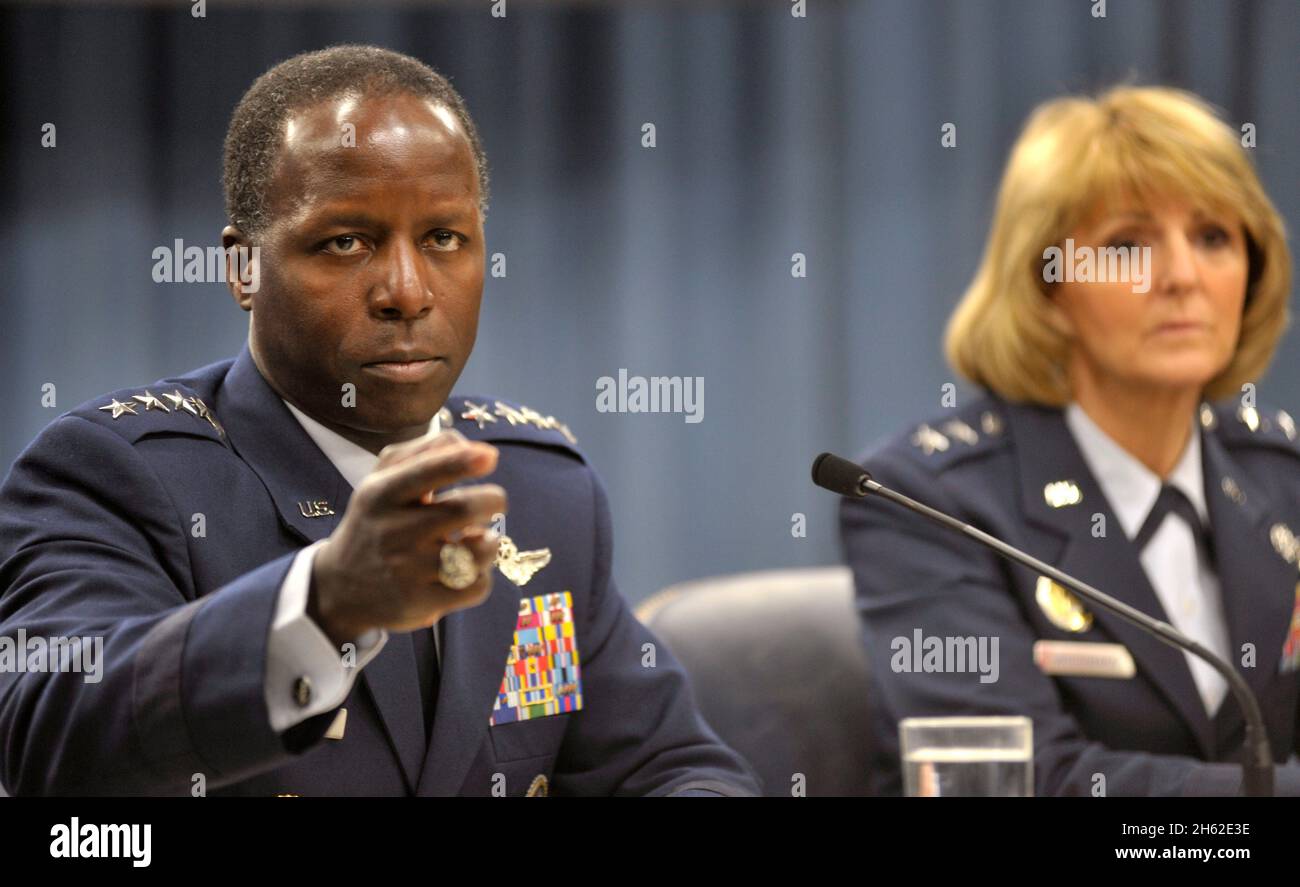 U.S. Air Force General Edward Rice Jr., left, the commander of the Air ...