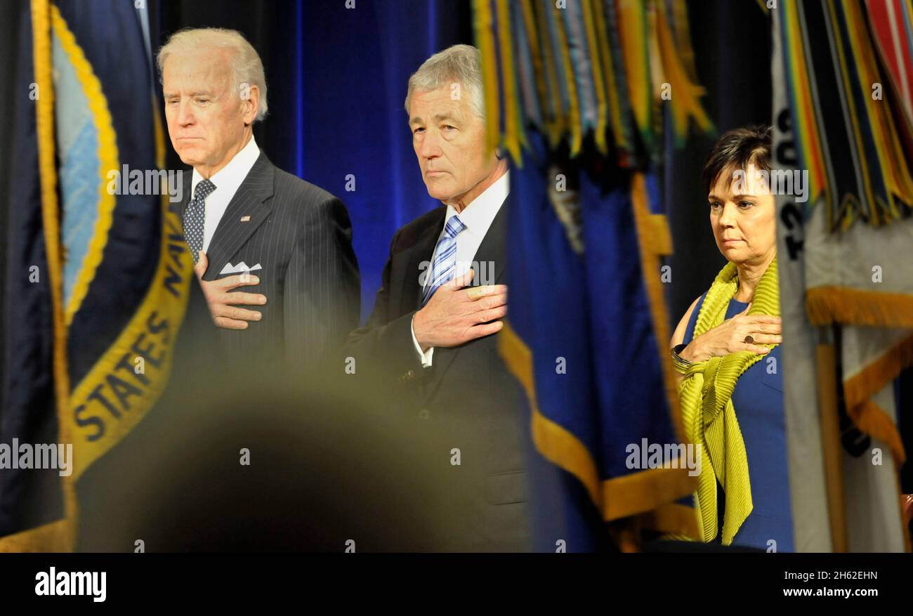 Secretary of Defense Chuck Hagel, center, his wife Lilibet Hagel and ...