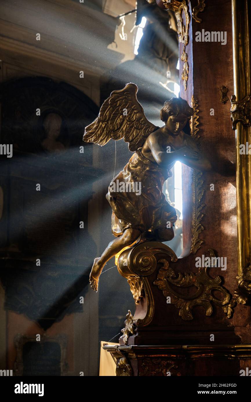 Dust particles shinning against a sunray coming from a window Inside ...