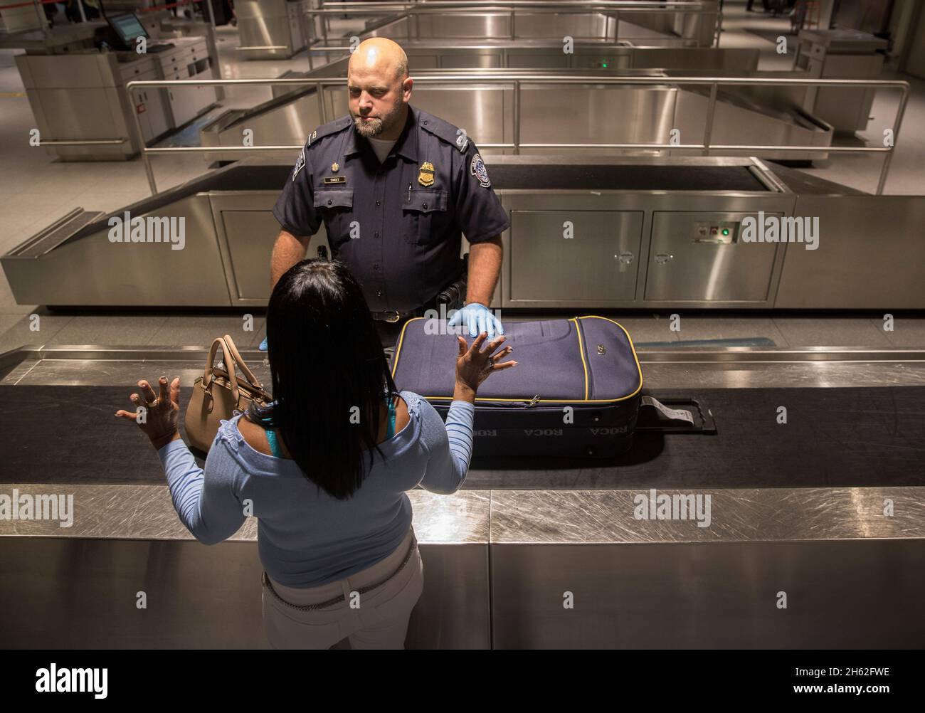 Officers with the U.S. Customs and Border Protection, Office of Field ...