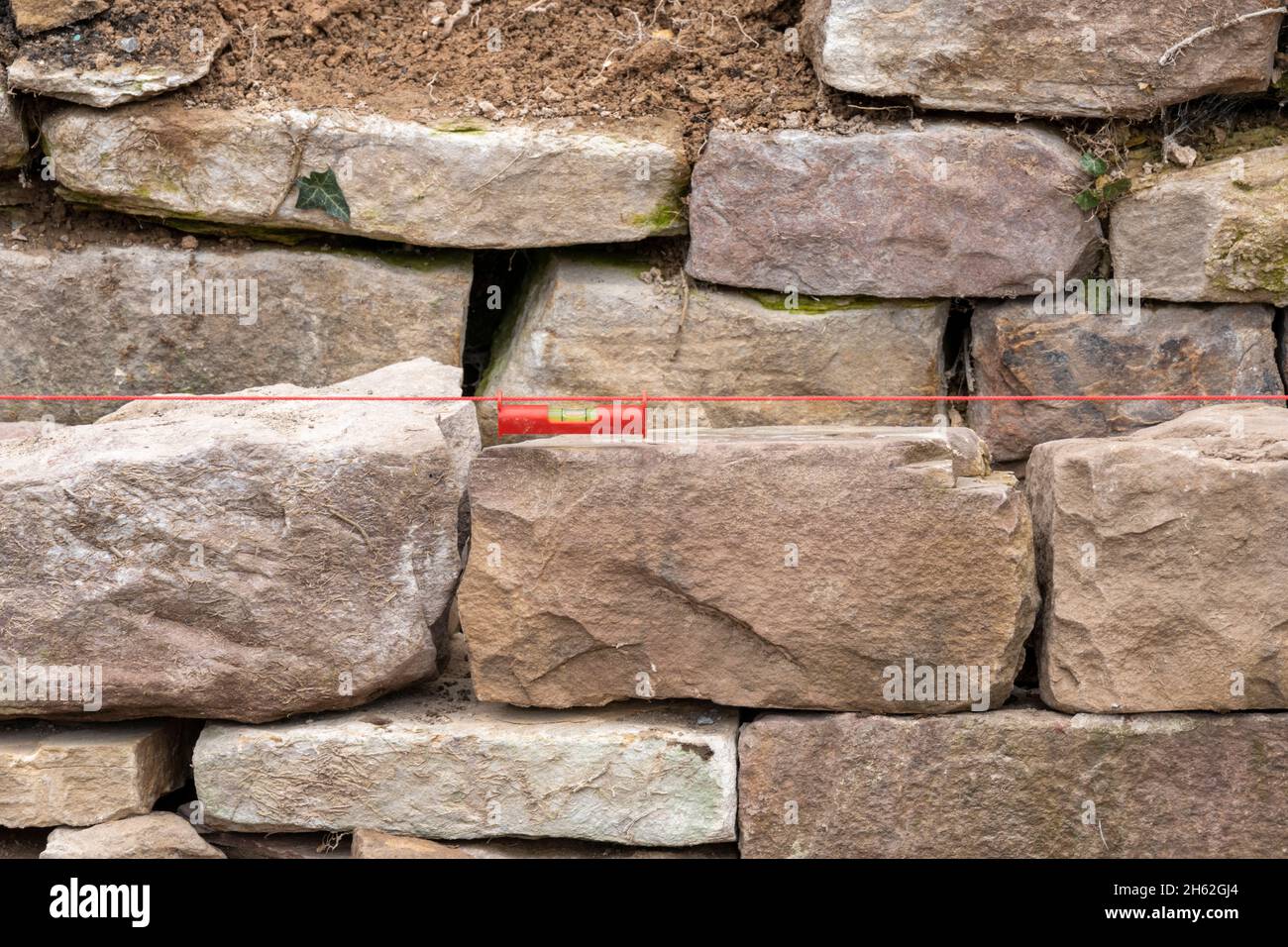 create a dry stone wall Stock Photo - Alamy