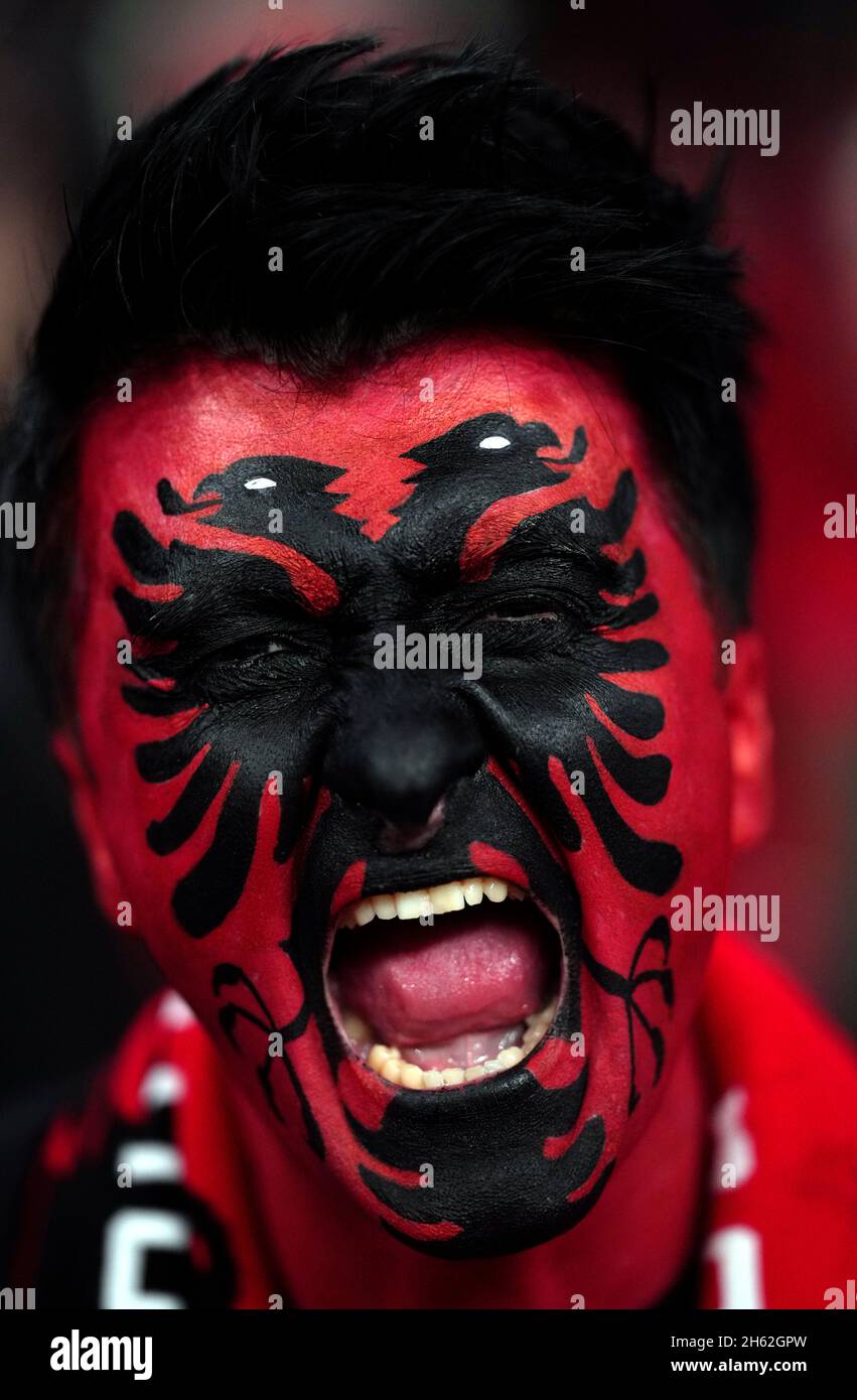 An Albania fan with face paint in the stands during the FIFA World Cup ...