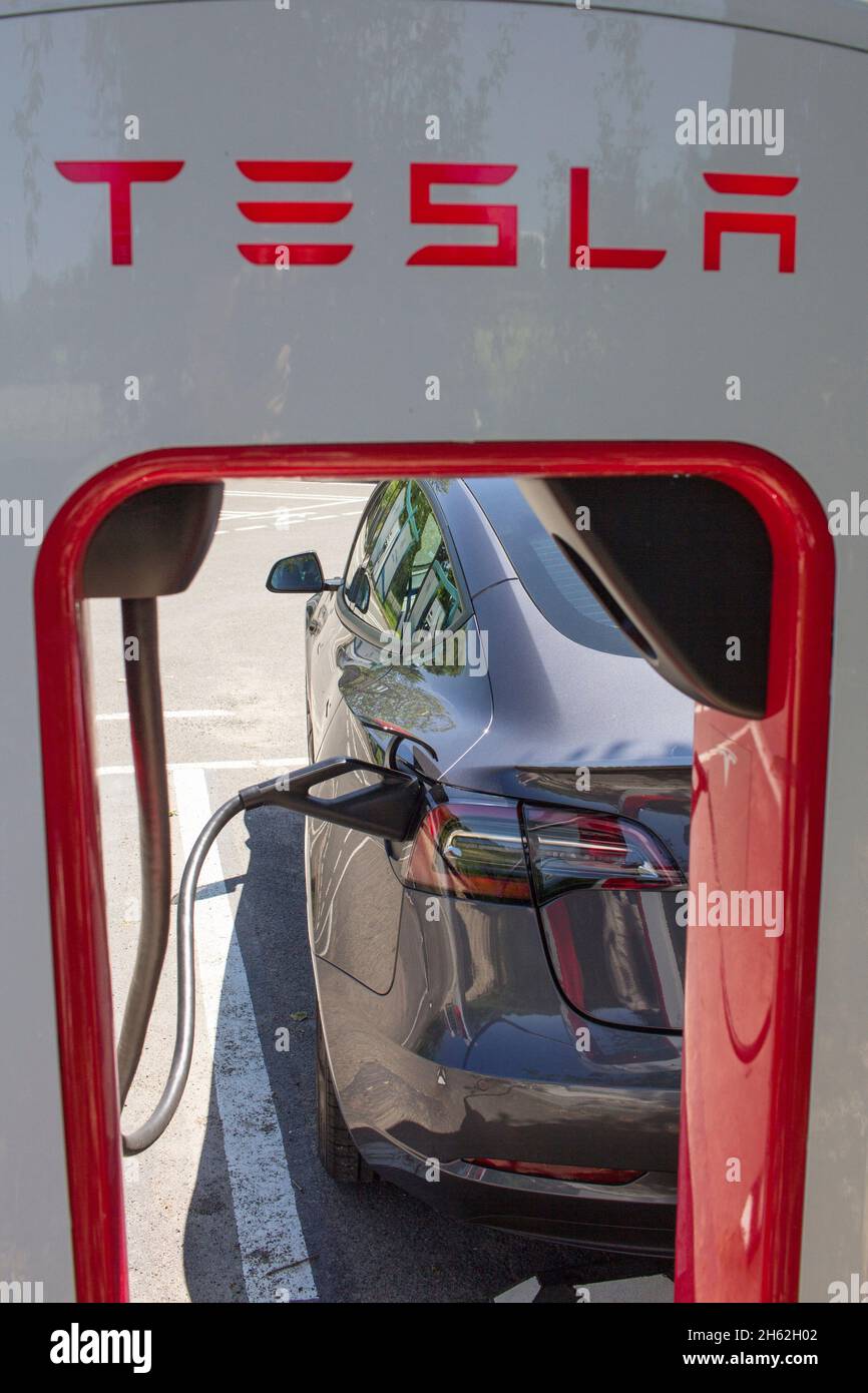 road trip through germany in a tesla model 3 performance Stock Photo ...