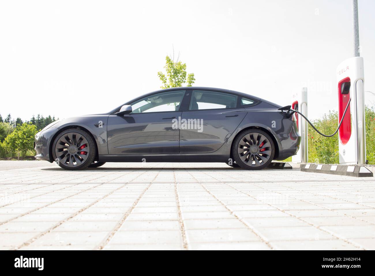 road trip through germany in a tesla model 3 performance Stock Photo ...