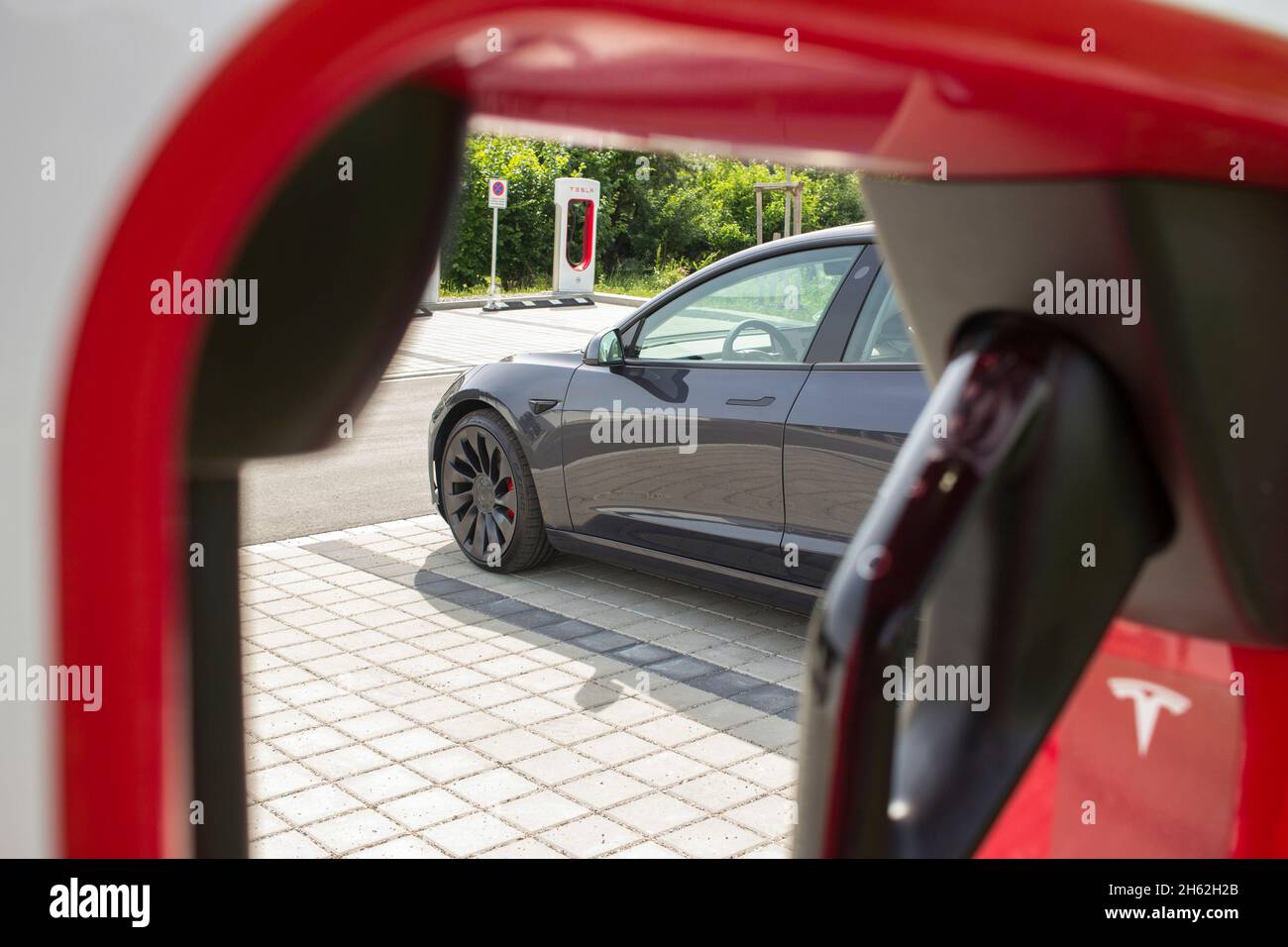road trip through germany in a tesla model 3 performance Stock Photo ...