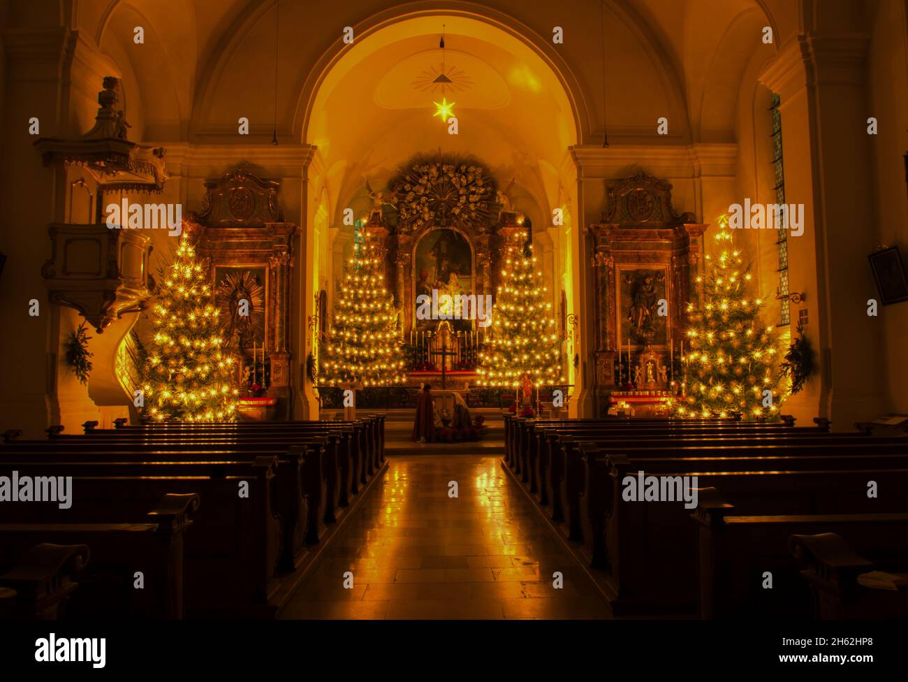 Interior of a church with Christmas decorations Stock Photo - Alamy