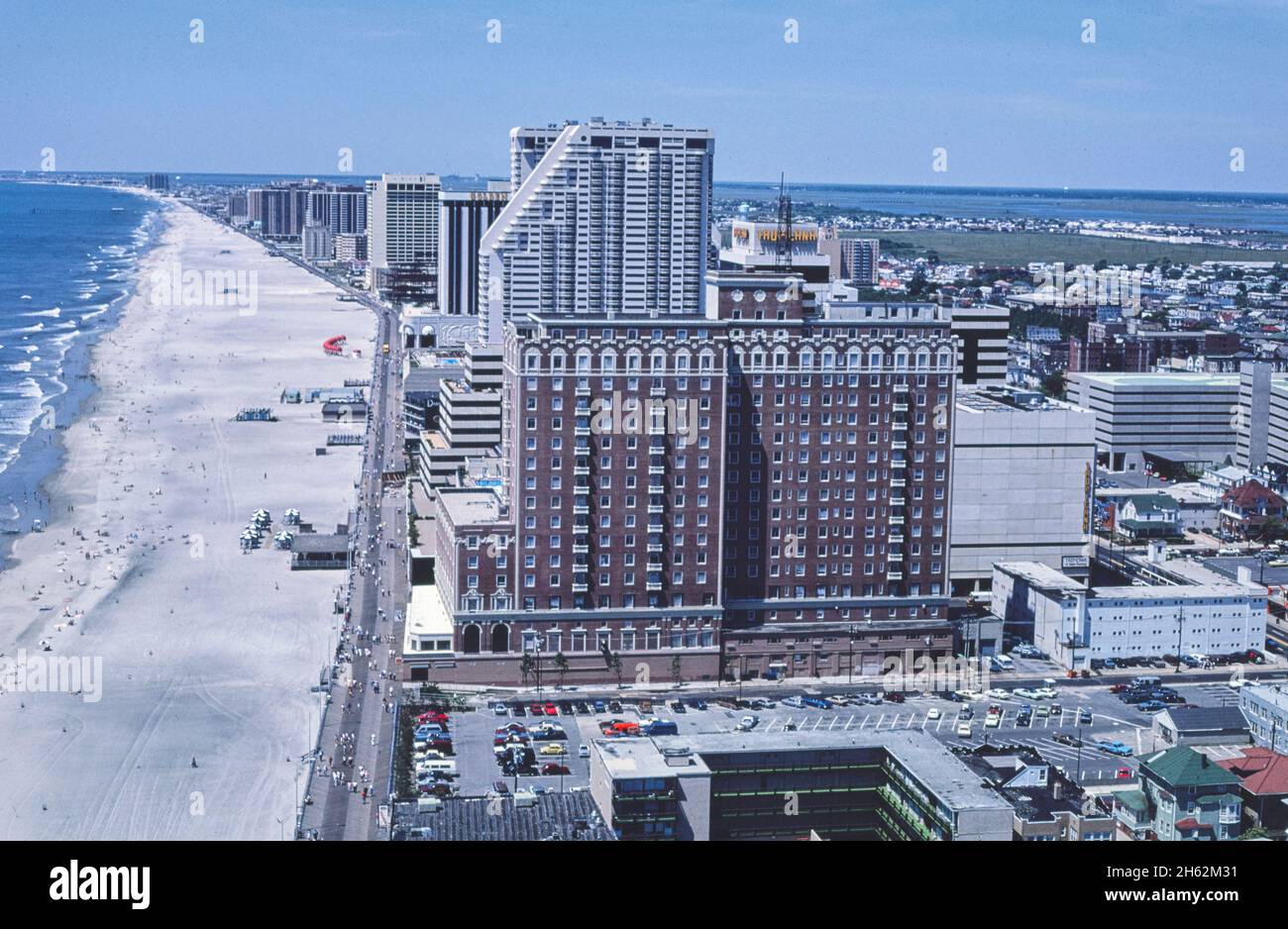 Beach and boardwalk, Atlantic City, New Jersey; ca. 1985 Stock Photo ...
