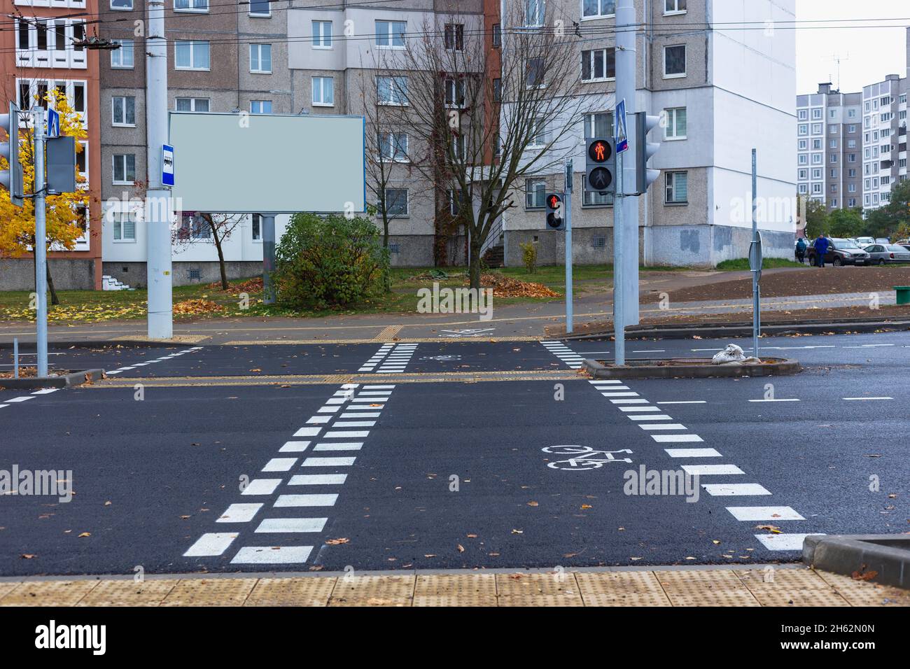 Bicycle path passing through the pedestrian crossing Stock Photo - Alamy