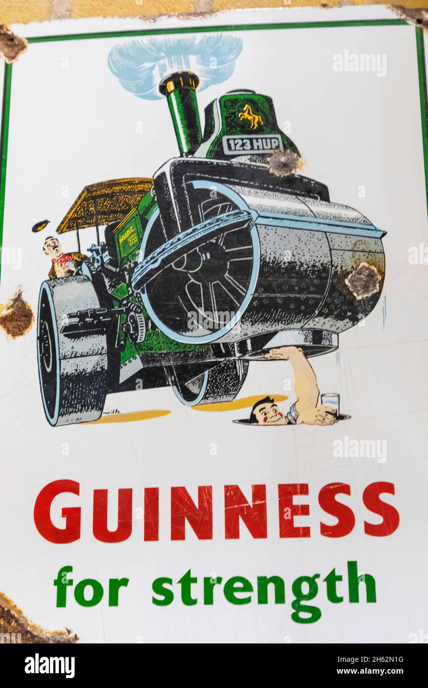 Vintage guinness advertising sign hi-res stock photography and images ...