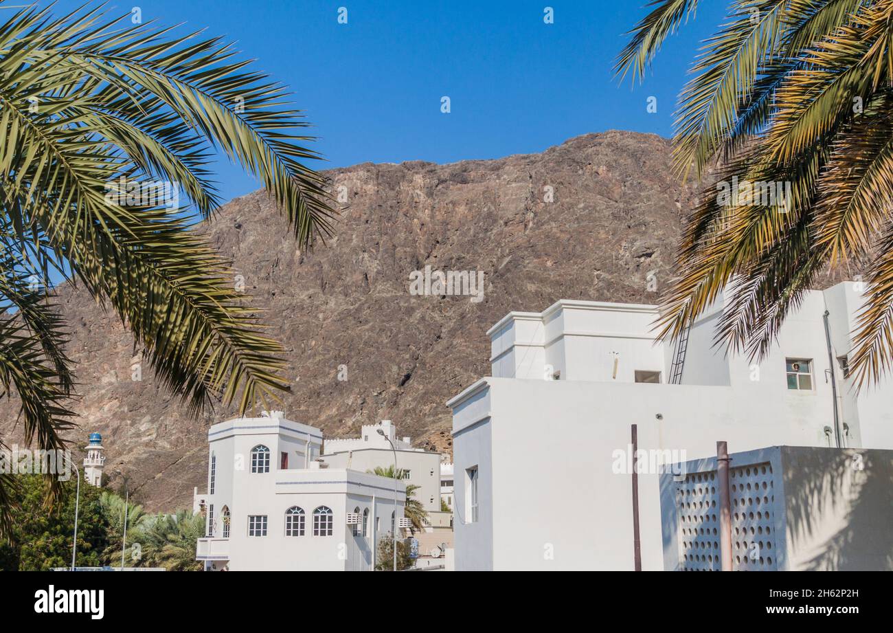 Buildings and mountains in Muscat, Oman Stock Photo - Alamy