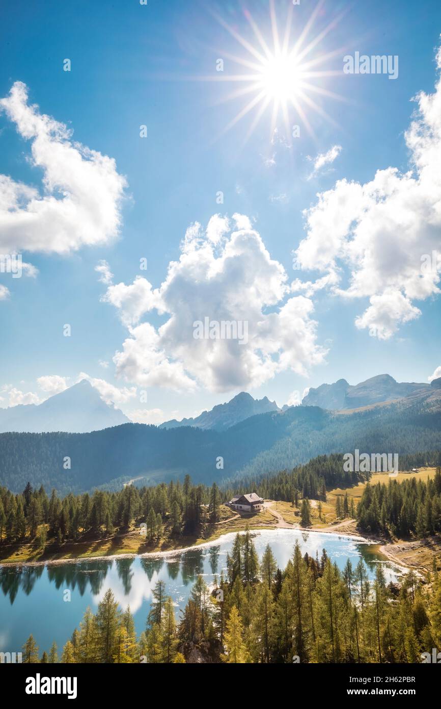 Alpine lake croda da lago hut with becco di mezzodi hi-res stock ...