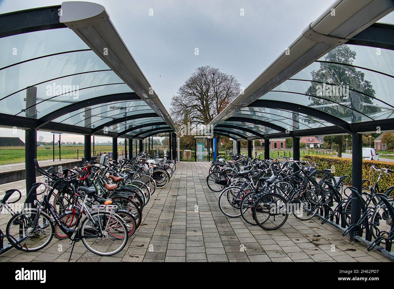 Outdoor bicycle parking at a railway station in a village in the ...