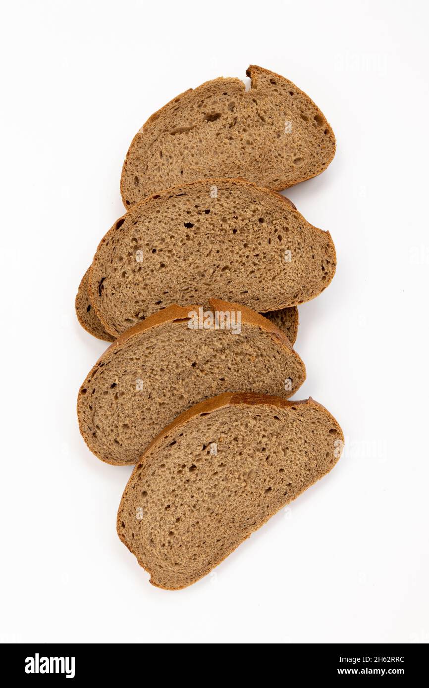 slices of rye bread on white background, top view, fresh delicious ...