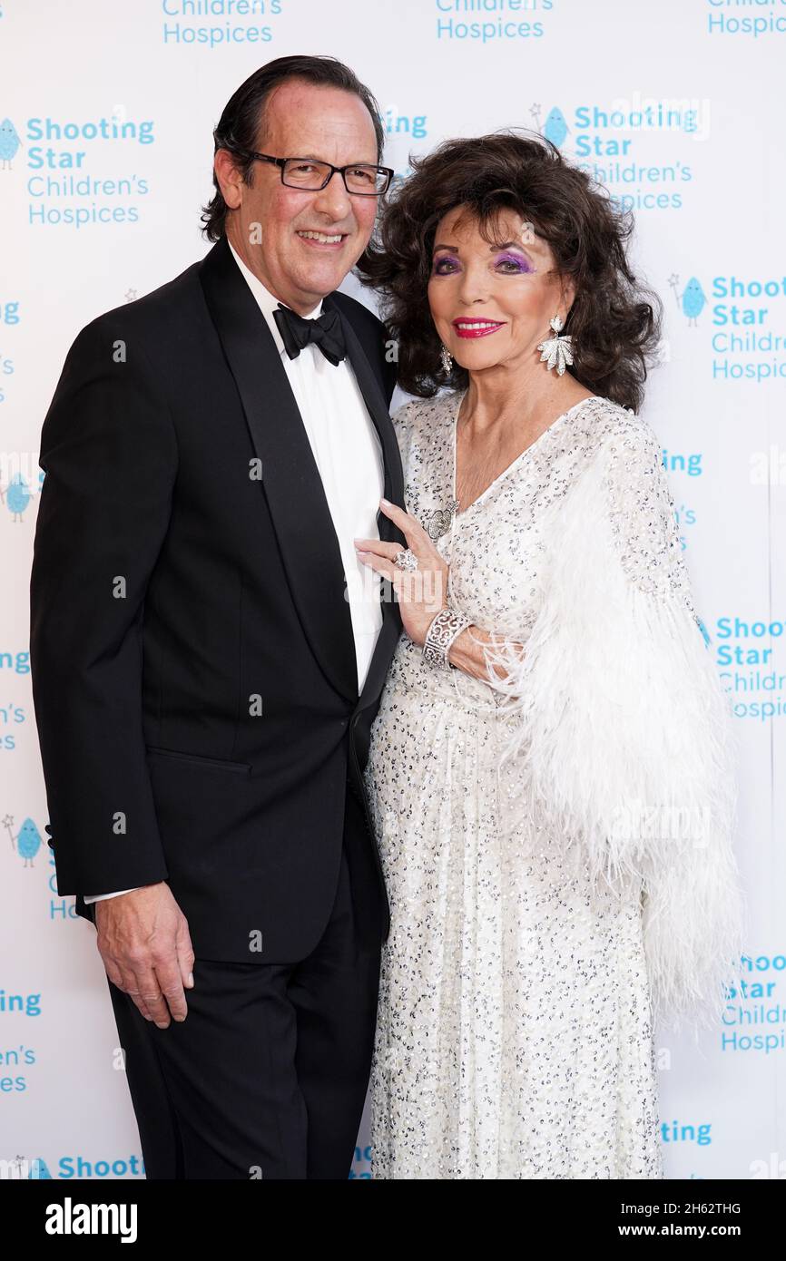 Percy Gibson and Dame Joan Collins arrive for the annual Shooting Star ...