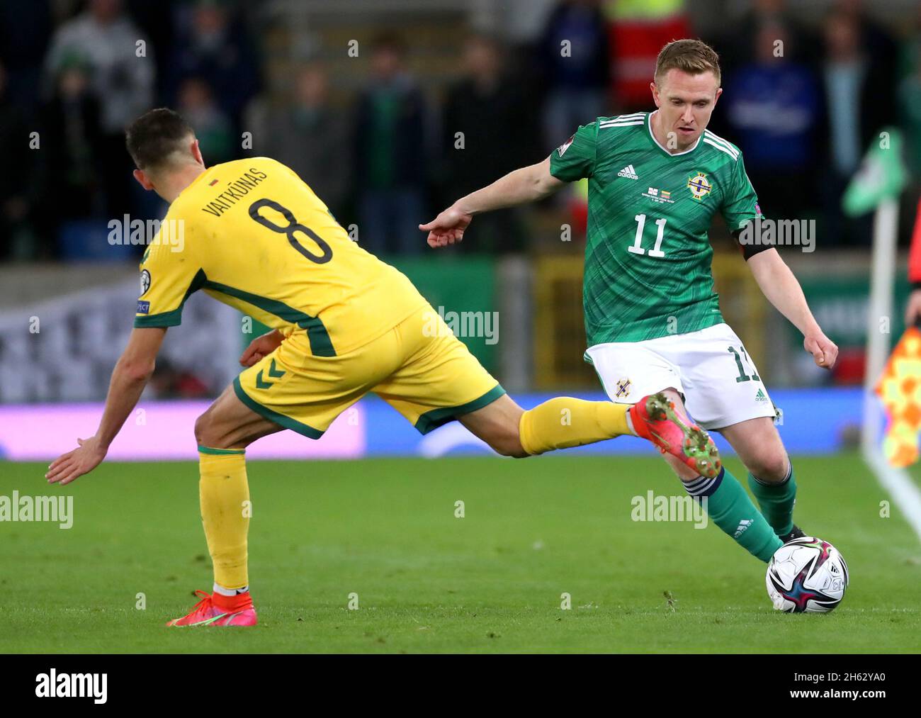 Northern Ireland's Shane Ferguson (right) and Lithuania's Egidijus ...
