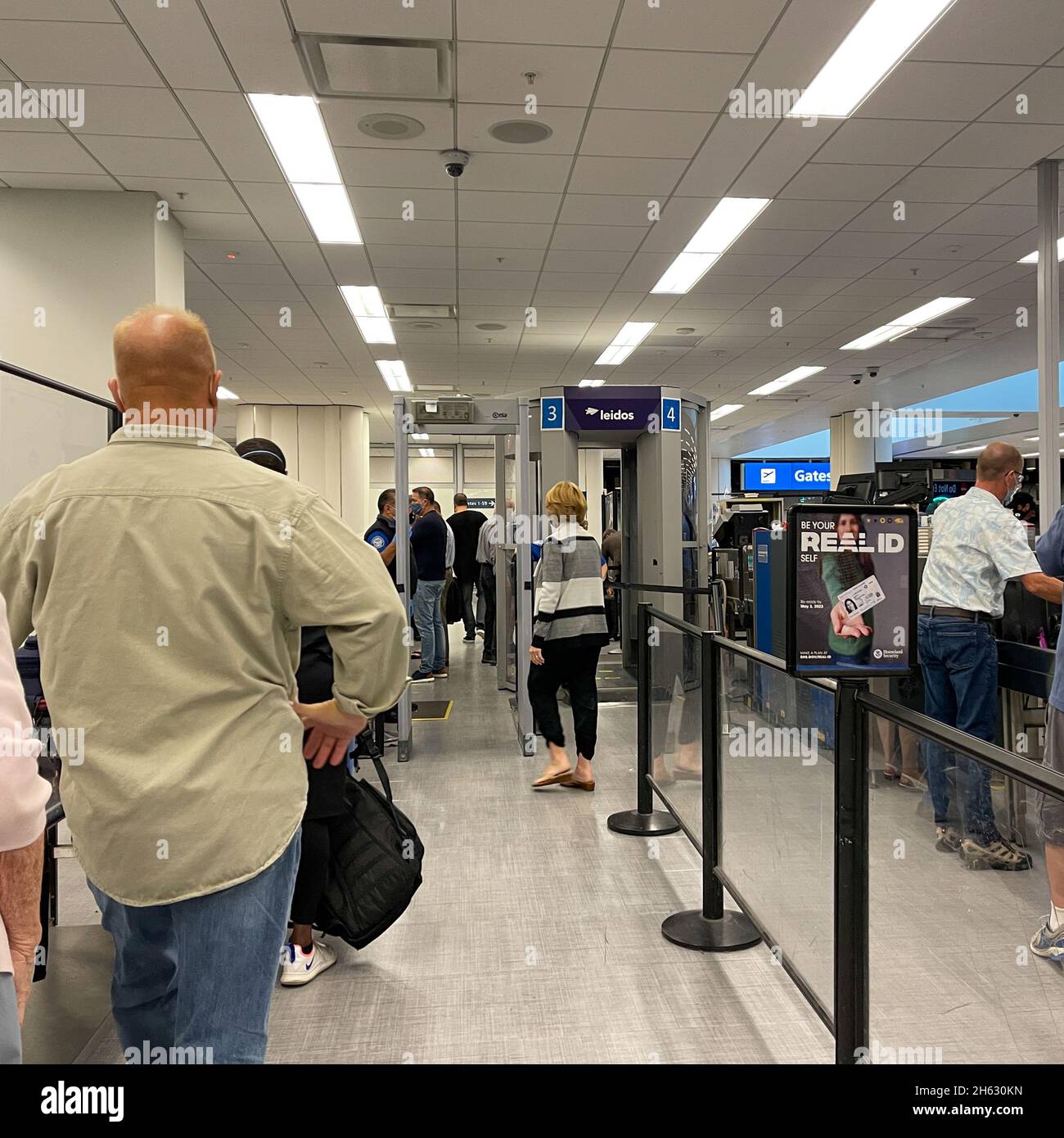 Orlando, FL USA - September 23, 2021: People walking through the ...
