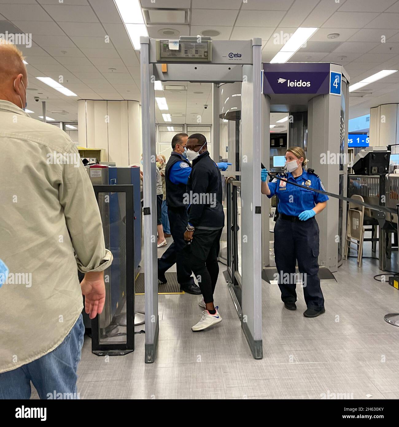 Orlando, FL USA - September 23, 2021: People walking through the ...