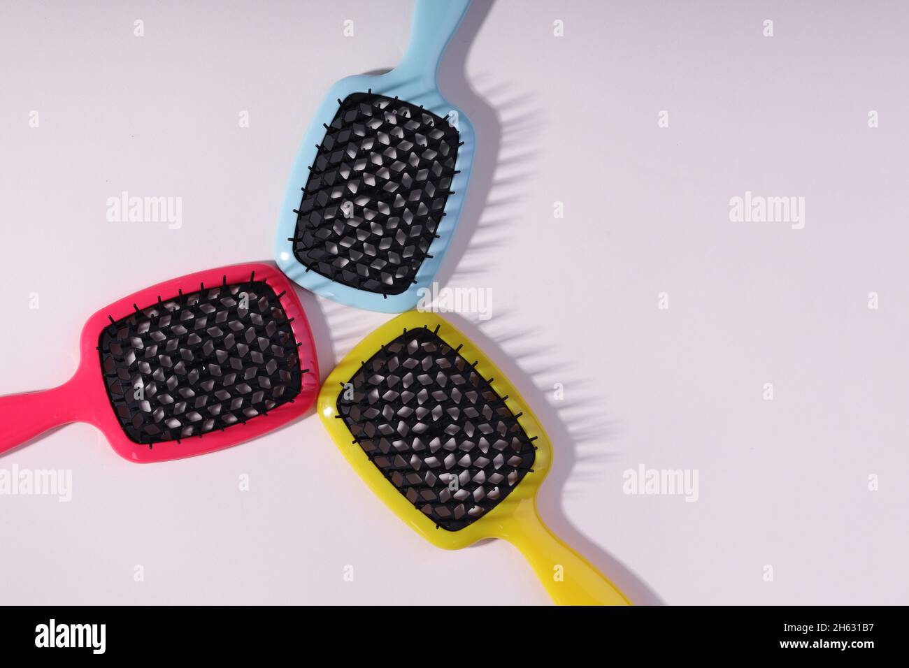 Multi-colored hair combs on an isolated white background Stock Photo ...