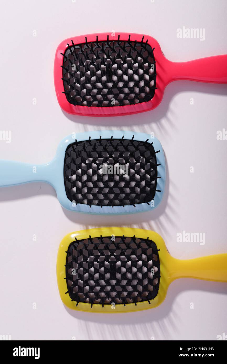 Multi-colored hair combs on an isolated white background Stock Photo ...