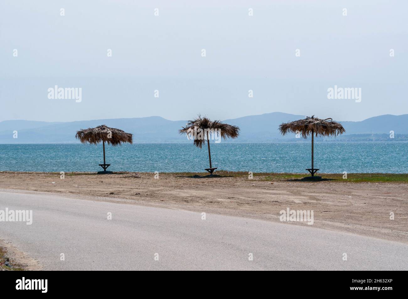 Three Sun Umbrellas Near The Beach Stock Photo Alamy three-sun-umbrellas-near-the-beach-stock-photo-alamy
