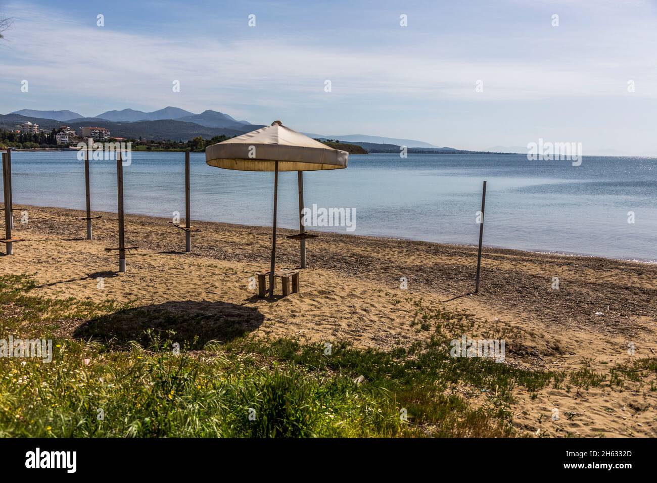 beach umbrella and ocean Stock Photo - Alamy