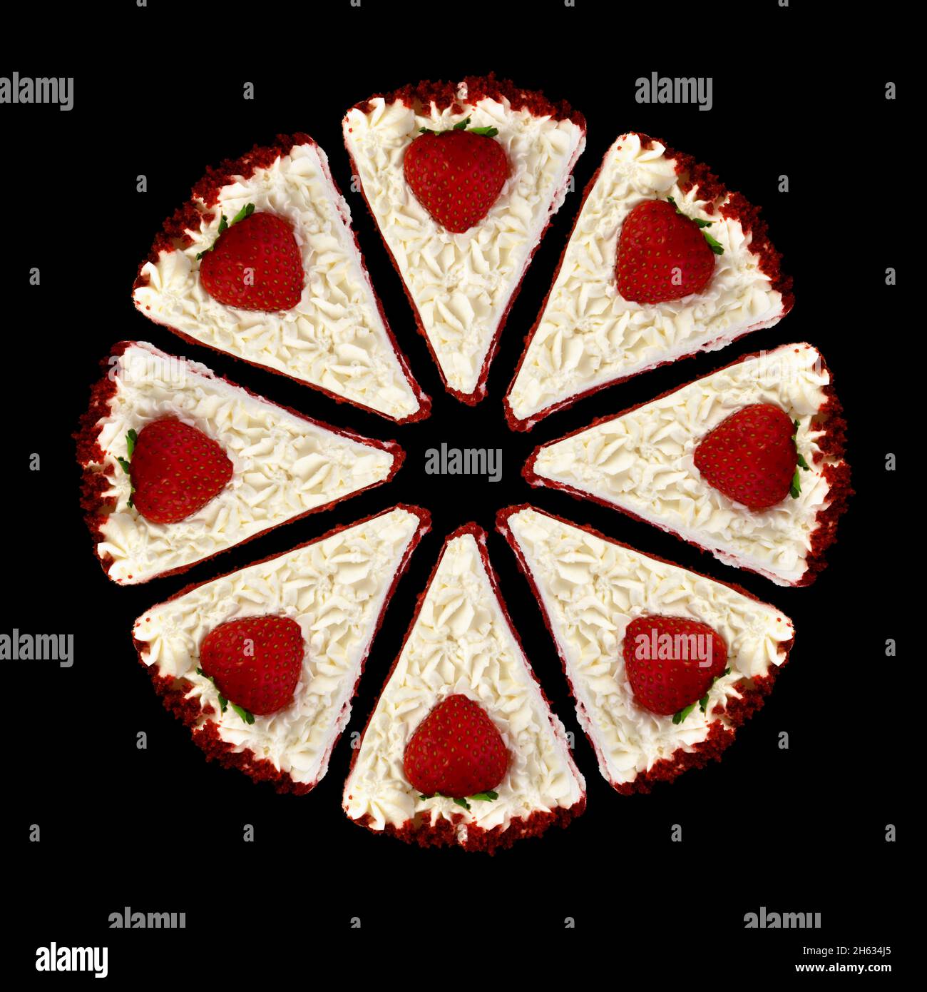 cake cut into equal pieces with strawberries, top view on a black ...