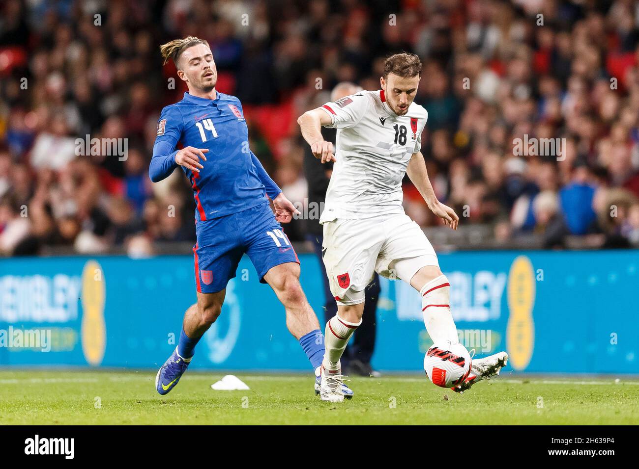London, UK. 12th Nov, 2021. Ardian Ismajli of Albania and Jack Grealish ...