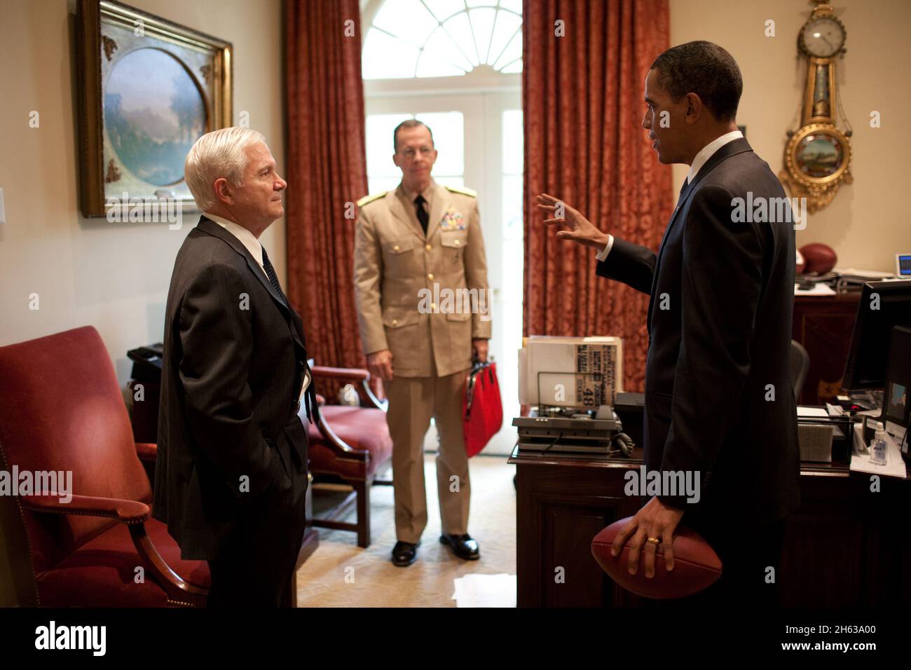 President Barack Obama talks with Secretary of Defense Robert Gates ...