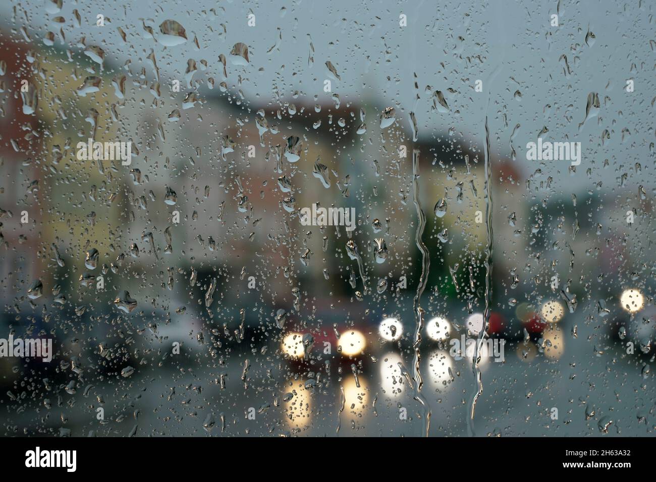 germany,bavaria,upper bavaria,neuötting,town square,traffic,rain,glass ...
