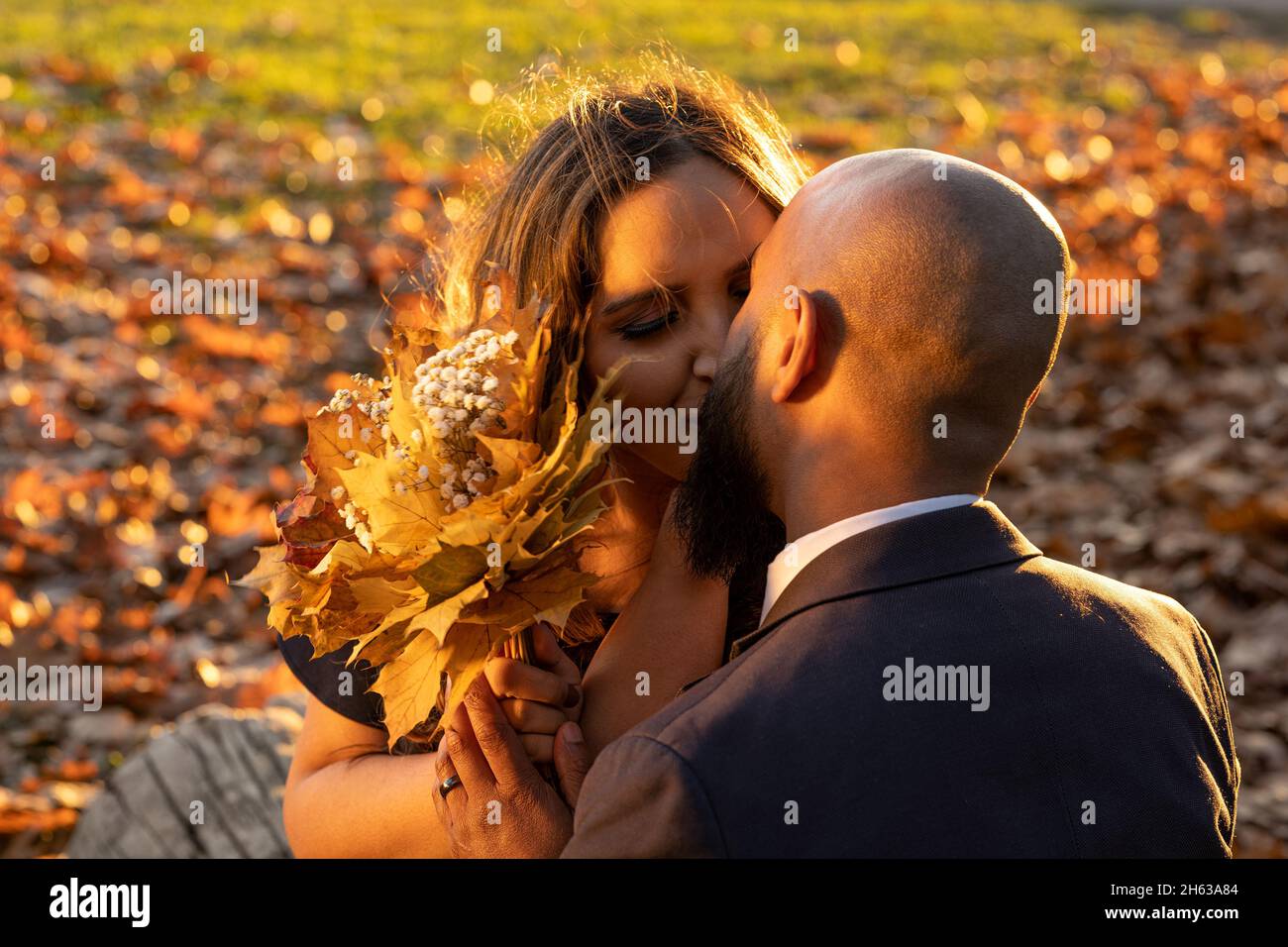 Emotional, full of love photo of a well dressed mixed race couple ...