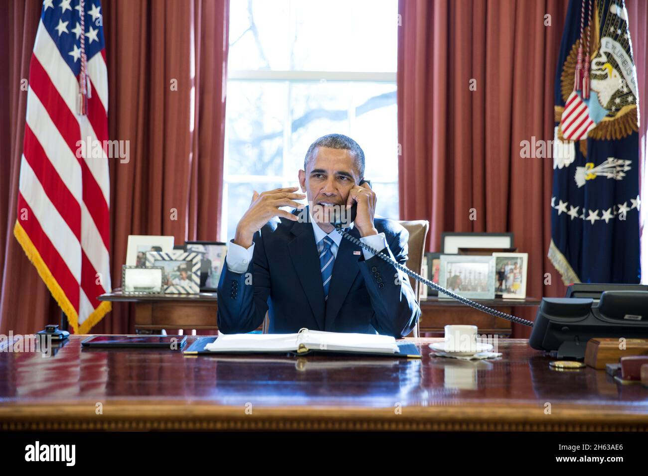 President Barack Obama talks on the phone with NASA astronaut Commander ...