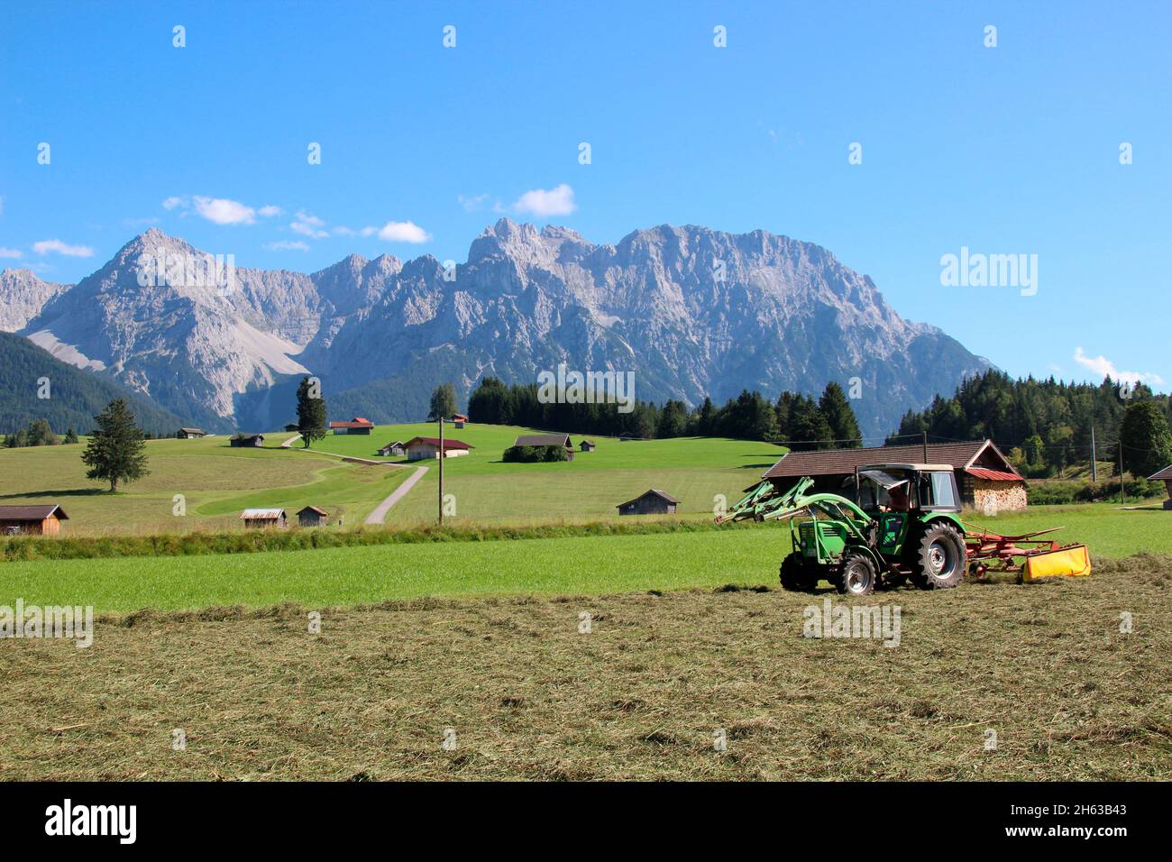 Deutz d 4506 tractor with rotary swather hi-res stock photography and ...