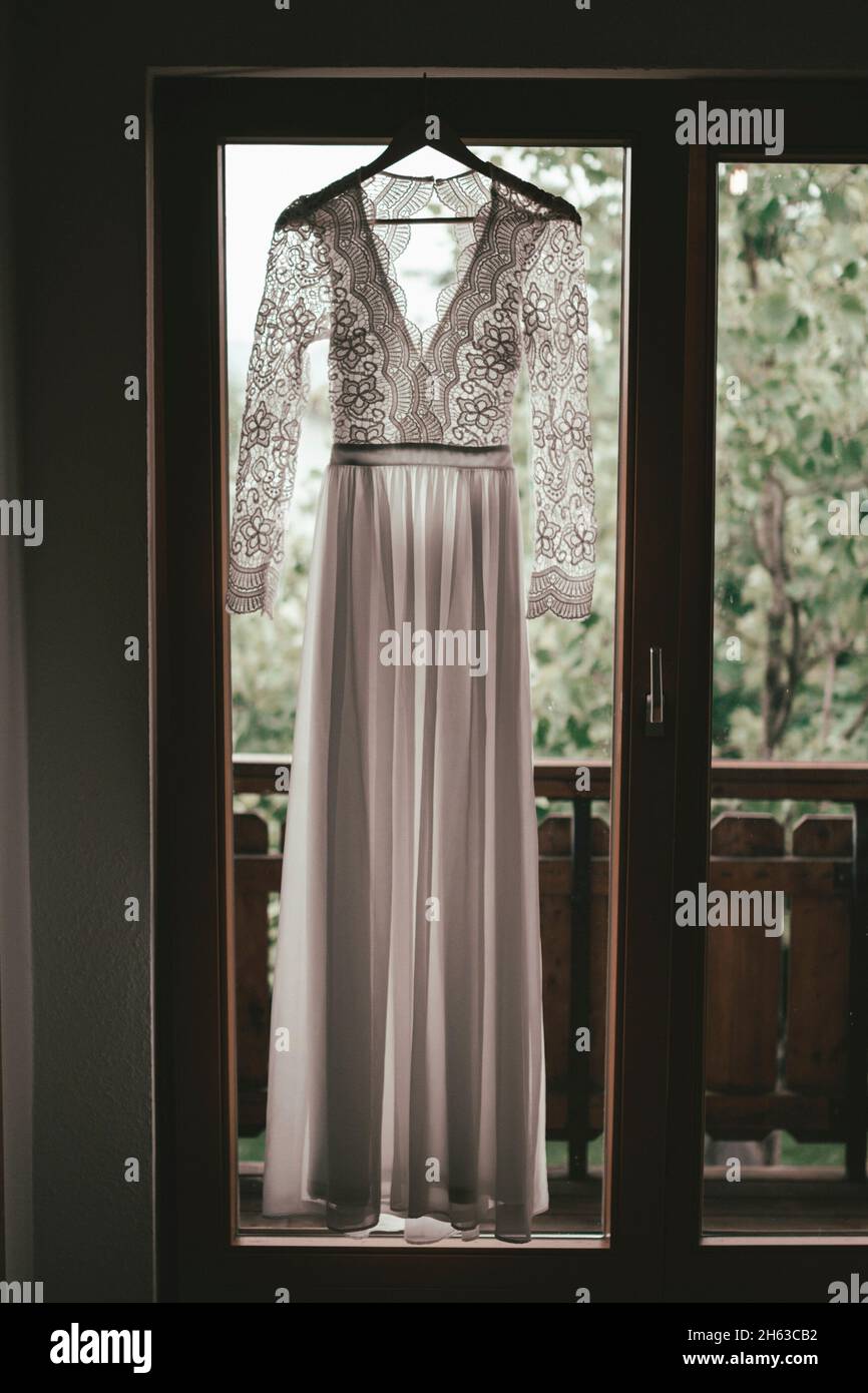 wedding dress in front of the window,wedding dress in the backlight ...