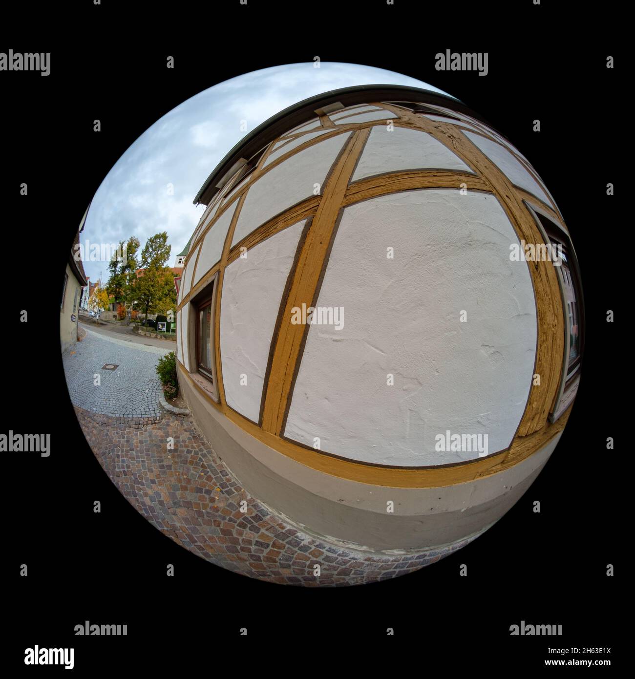 Timber frame house facade in fish eye distortion shot Stock Photo - Alamy