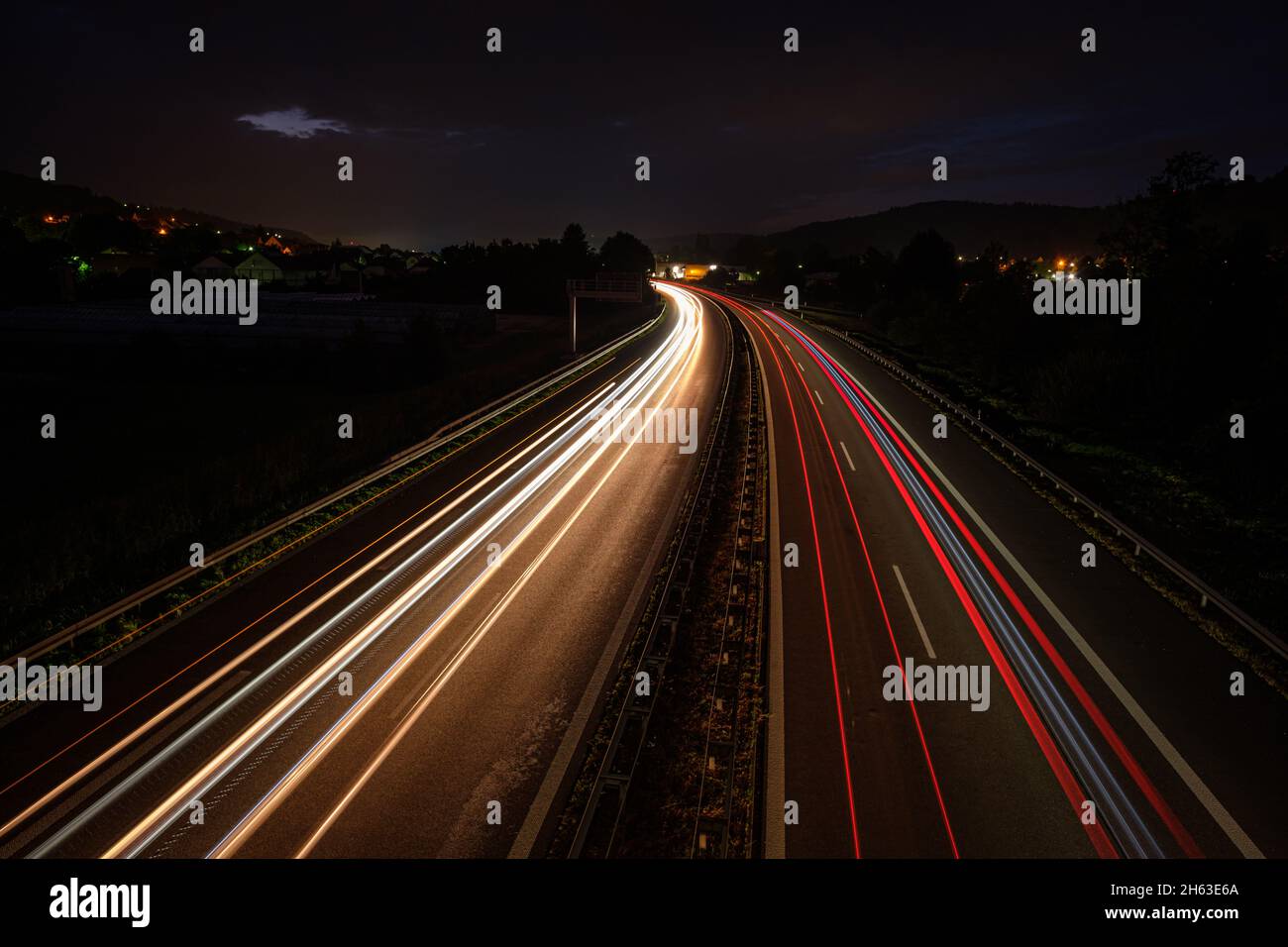 Abstract light trails in the night of cars and trucks motorway Stock ...
