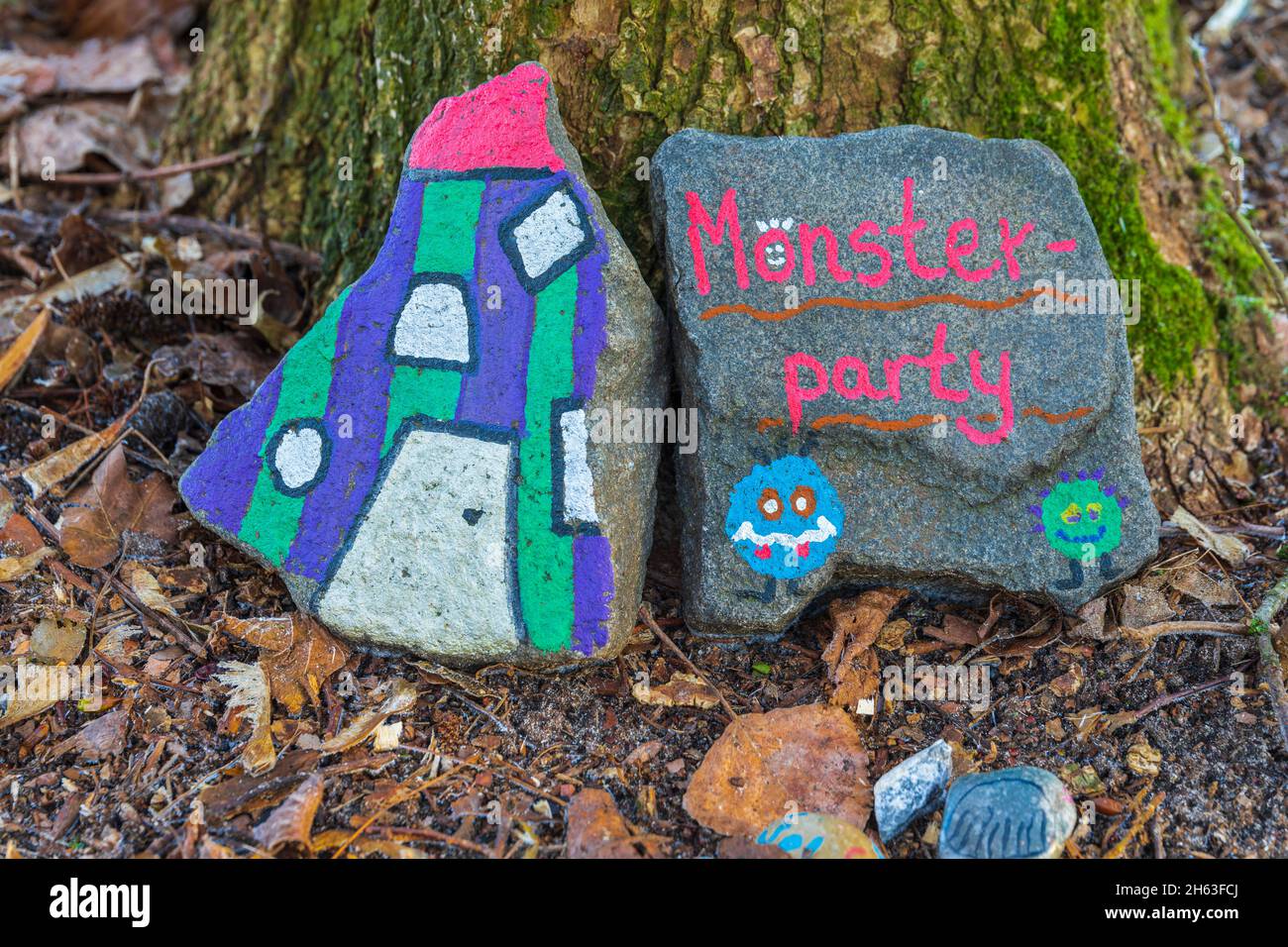 painted stone with happy messages,encouragement stone Stock Photo - Alamy