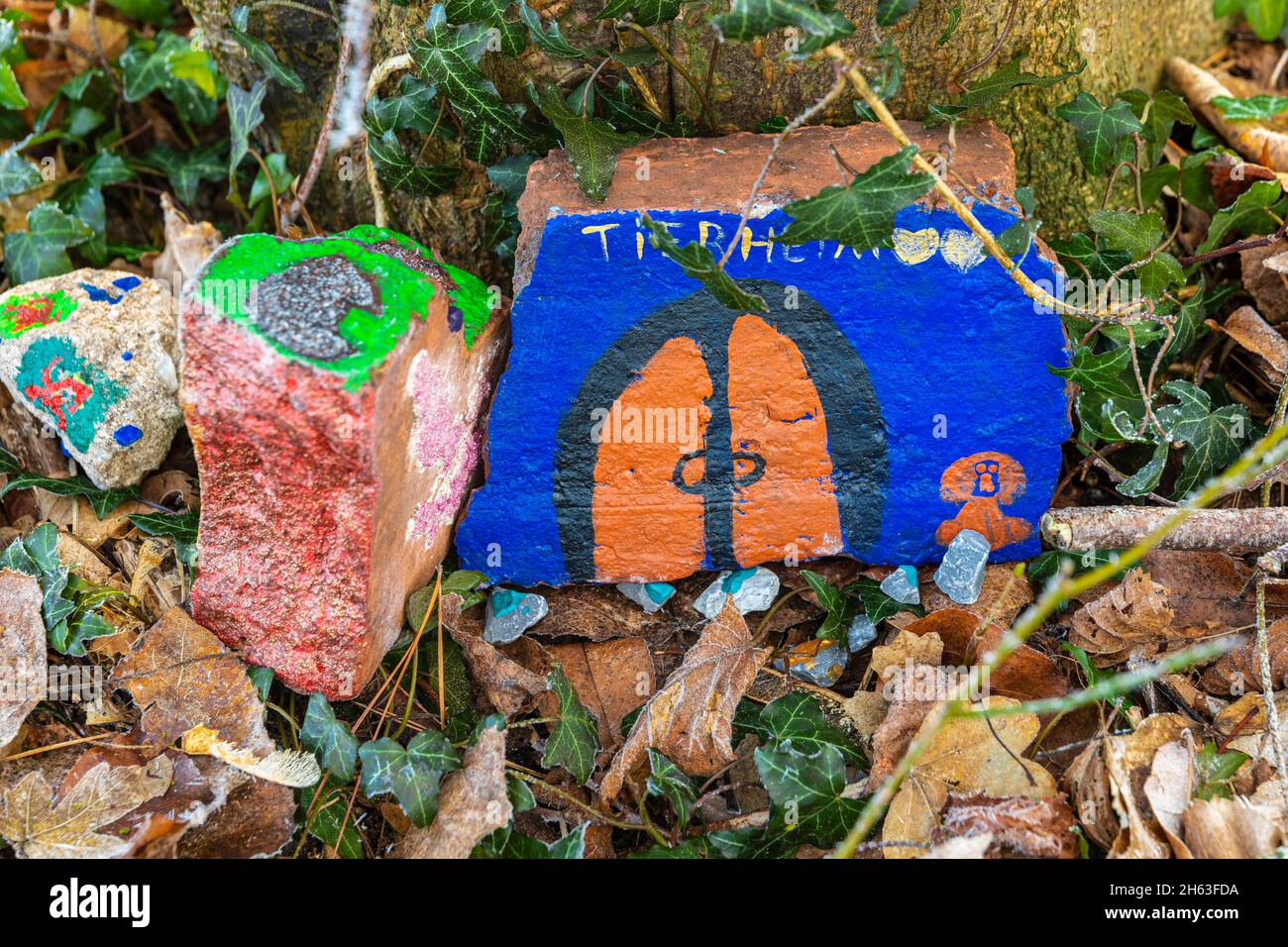painted stone with happy messages,encouragement stone Stock Photo - Alamy