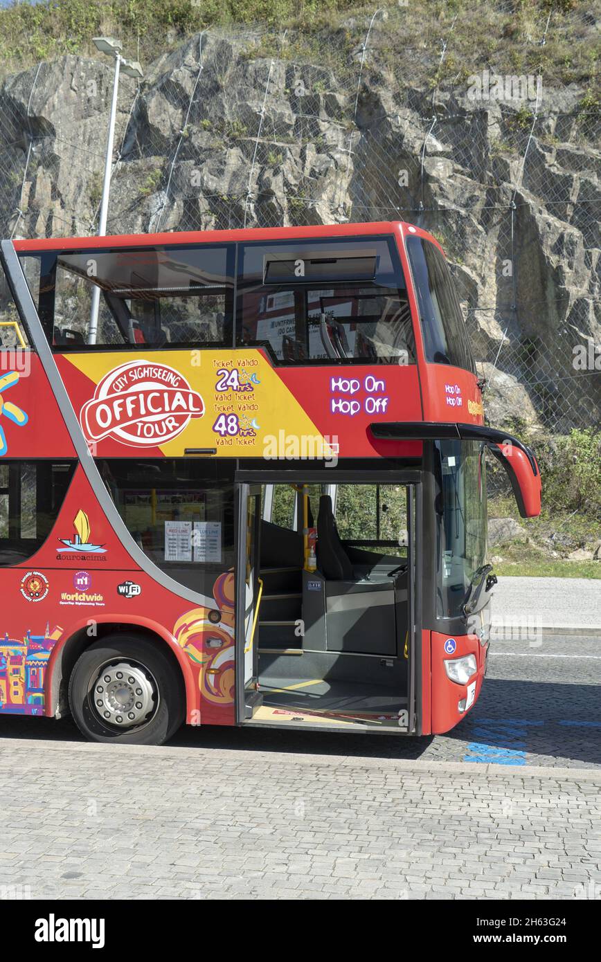 PORTO, PORTUGAL - Oct 07, 2021: A vertical closeup of a red two-floored ...