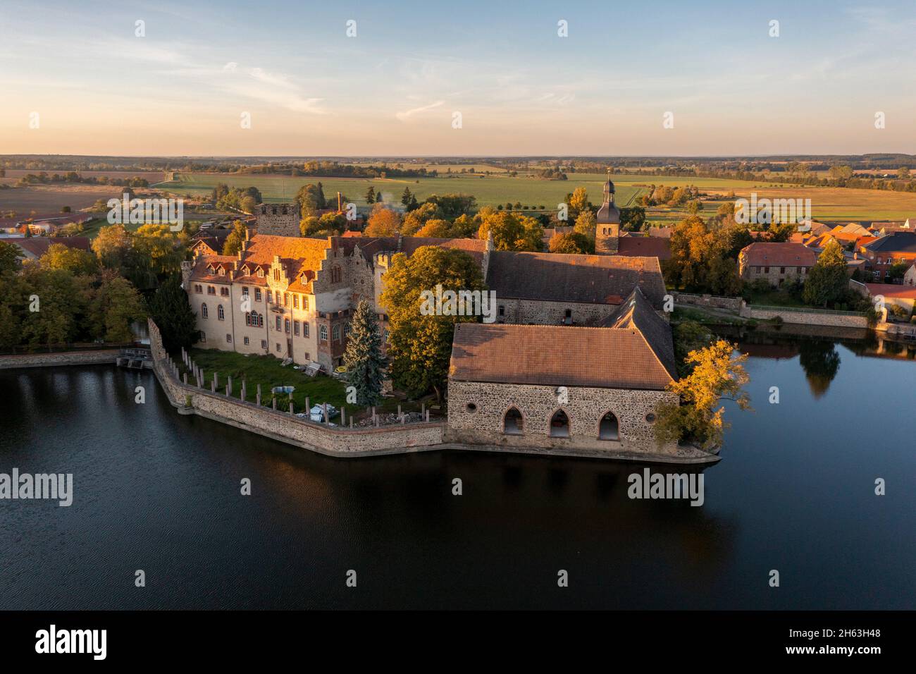 Flechtingen moated castle at sunset hi-res stock photography and images ...