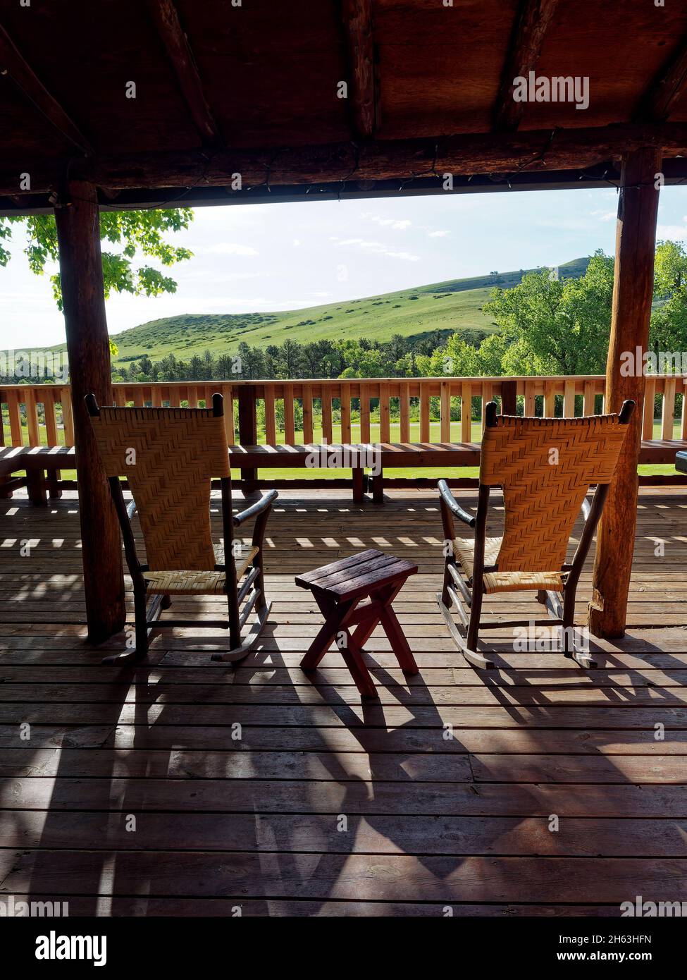 a view,american west,dude ranch,leisure,porch,relaxing,rocking chairs ...