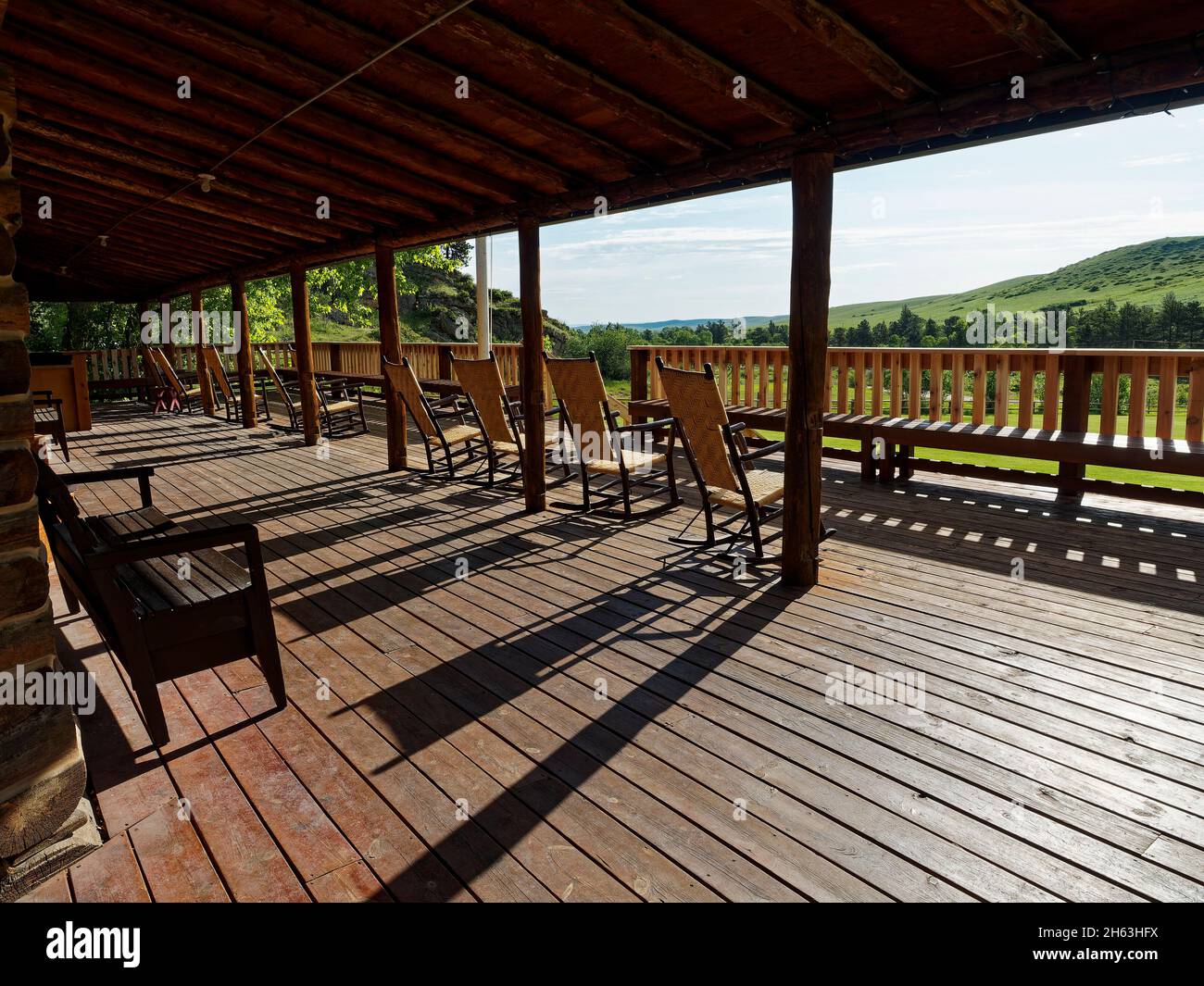 a view,american west,dude ranch,leisure,porch,relaxing,rocking chairs ...