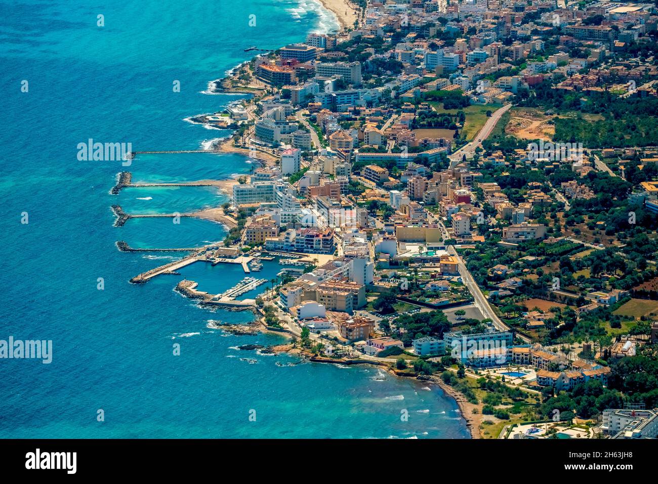 Town view and cala bona beach hi-res stock photography and images - Alamy