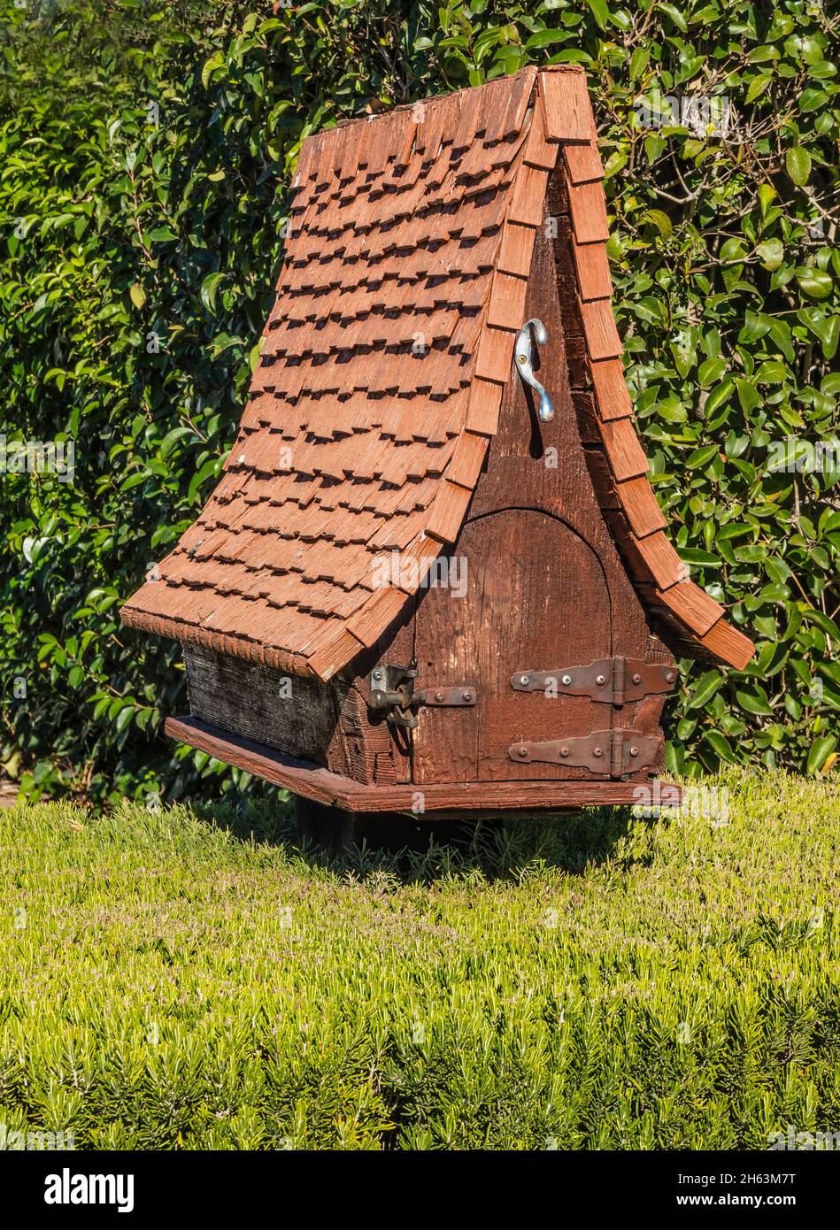 A Danish style building mailbox Stock Photo - Alamy
