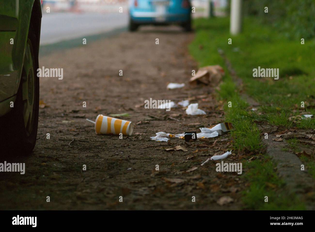 Fast food waste on a hard shoulder in downtown kiel hi-res stock ...
