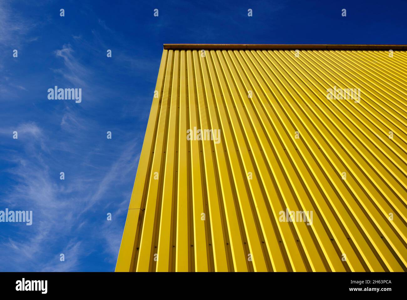 yellow warehouse,blue sky,perspective Stock Photo - Alamy
