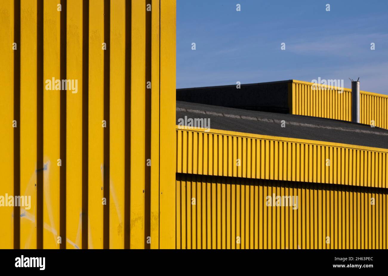 yellow warehouse,blue sky,industrial park Stock Photo - Alamy